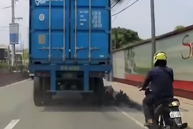 Watch video: Rider survives miraculously despite head going under truck ...