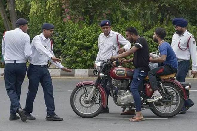 Riders caught without helmet asked to write essays by MP Police, here’s ...
