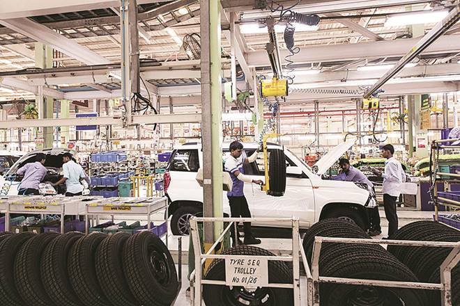 Factory output in June continues to shrink in double-digit ...